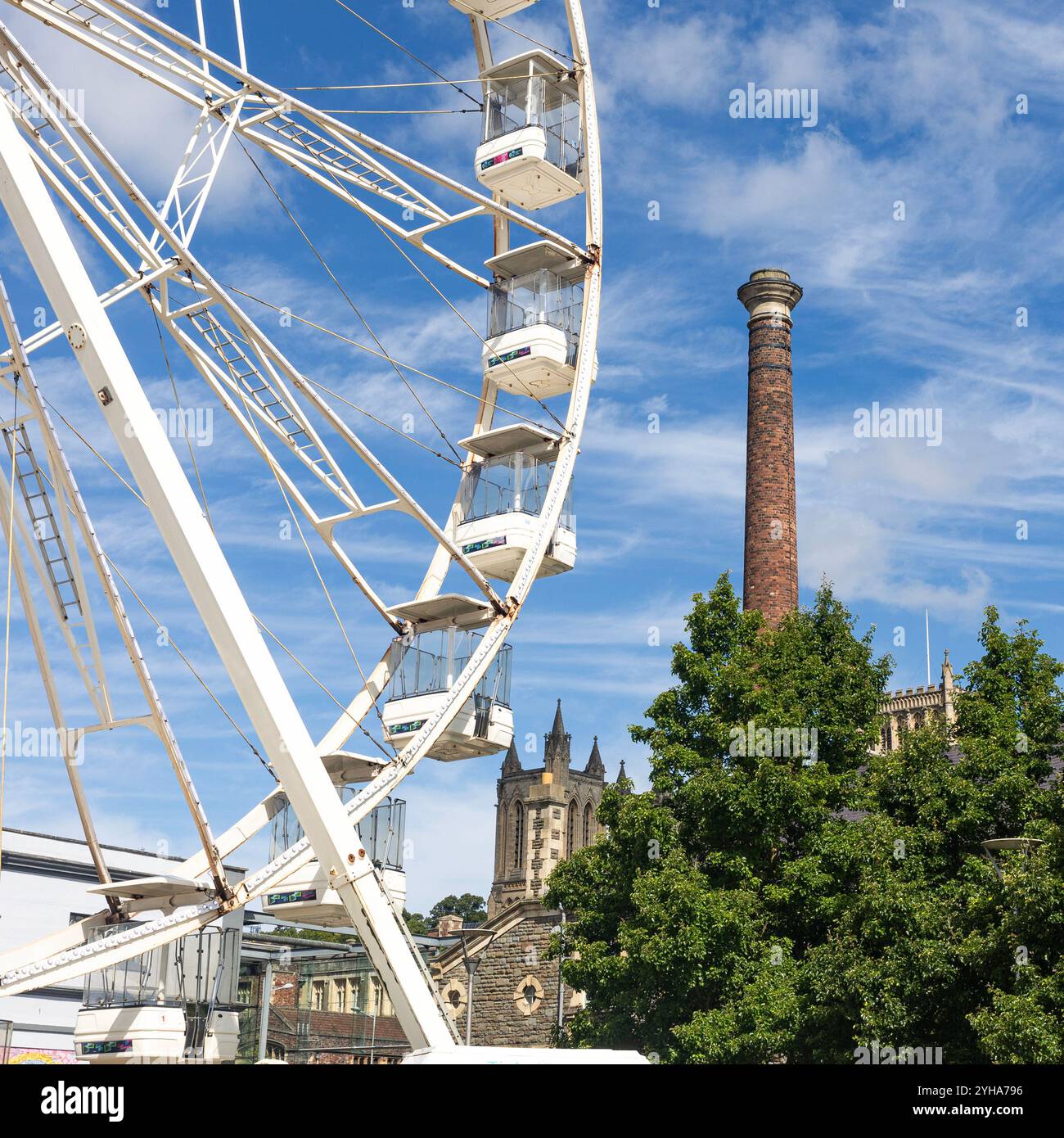 Anchor Square in Bristol, with big wheel and chimney tower in ...