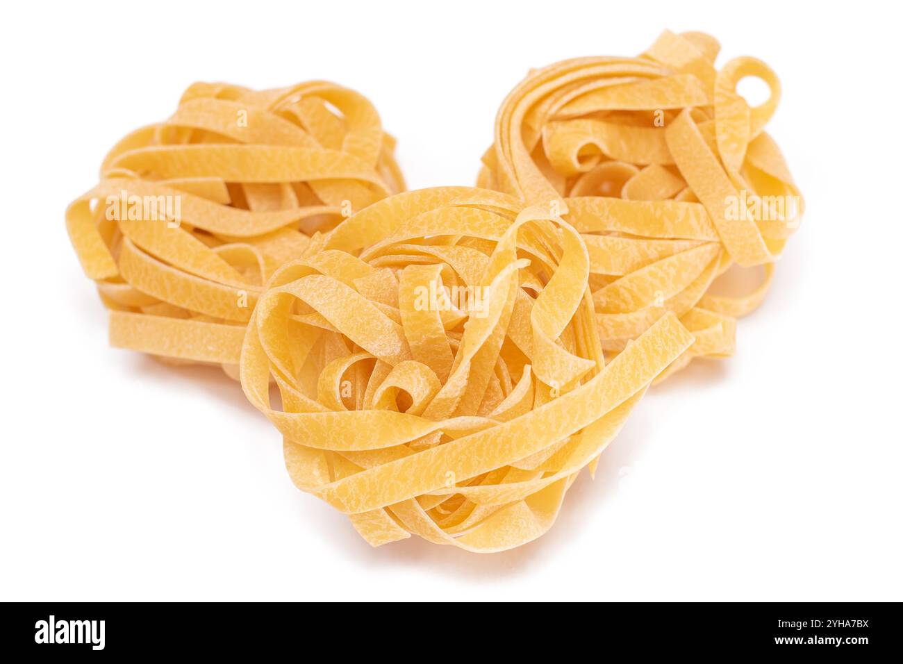 Three Classic Italian Raw Egg Fettuccine - Isolated on White Background ...