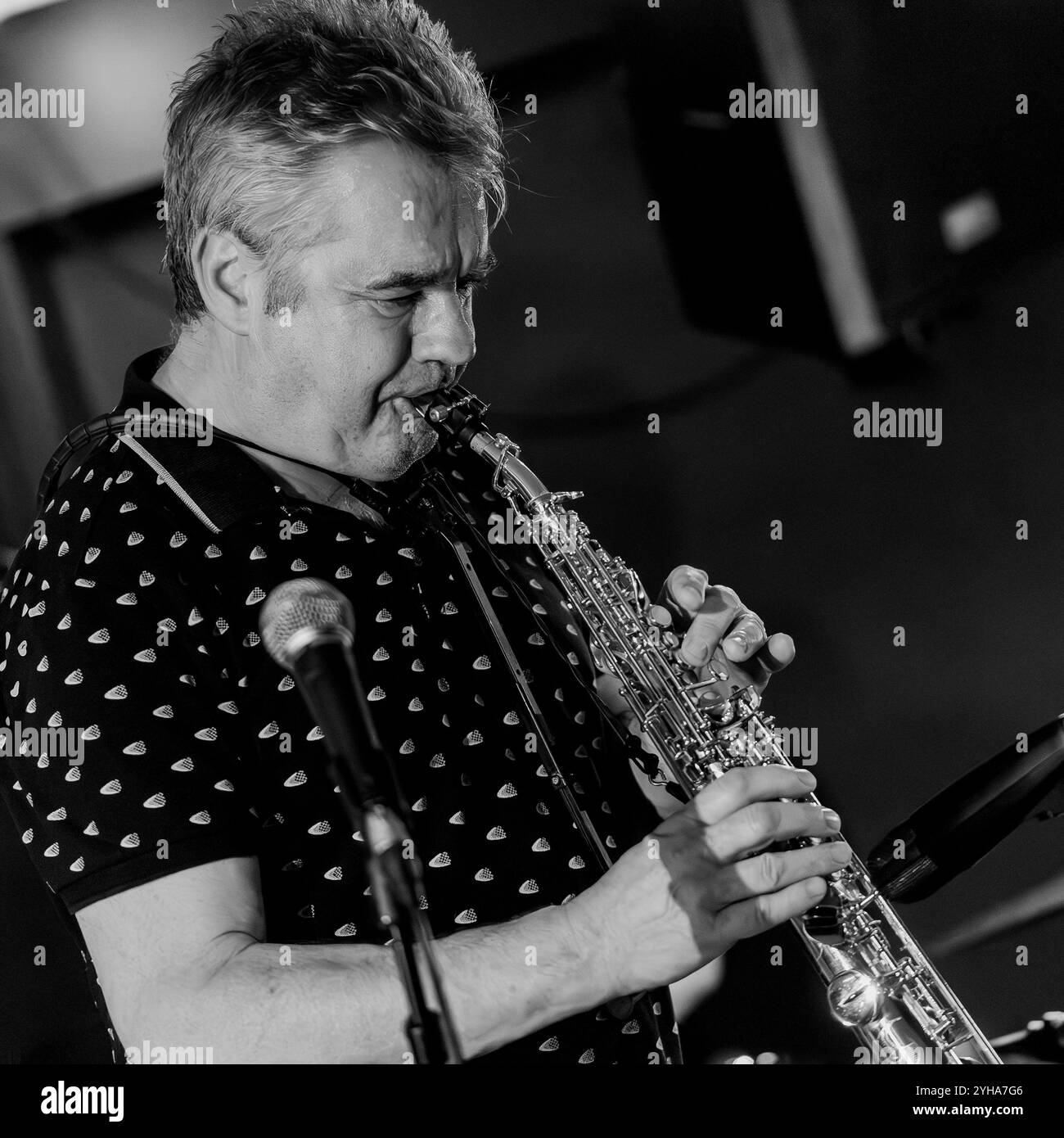 Musician playing soprano saxophone Black and White Stock Photos ...