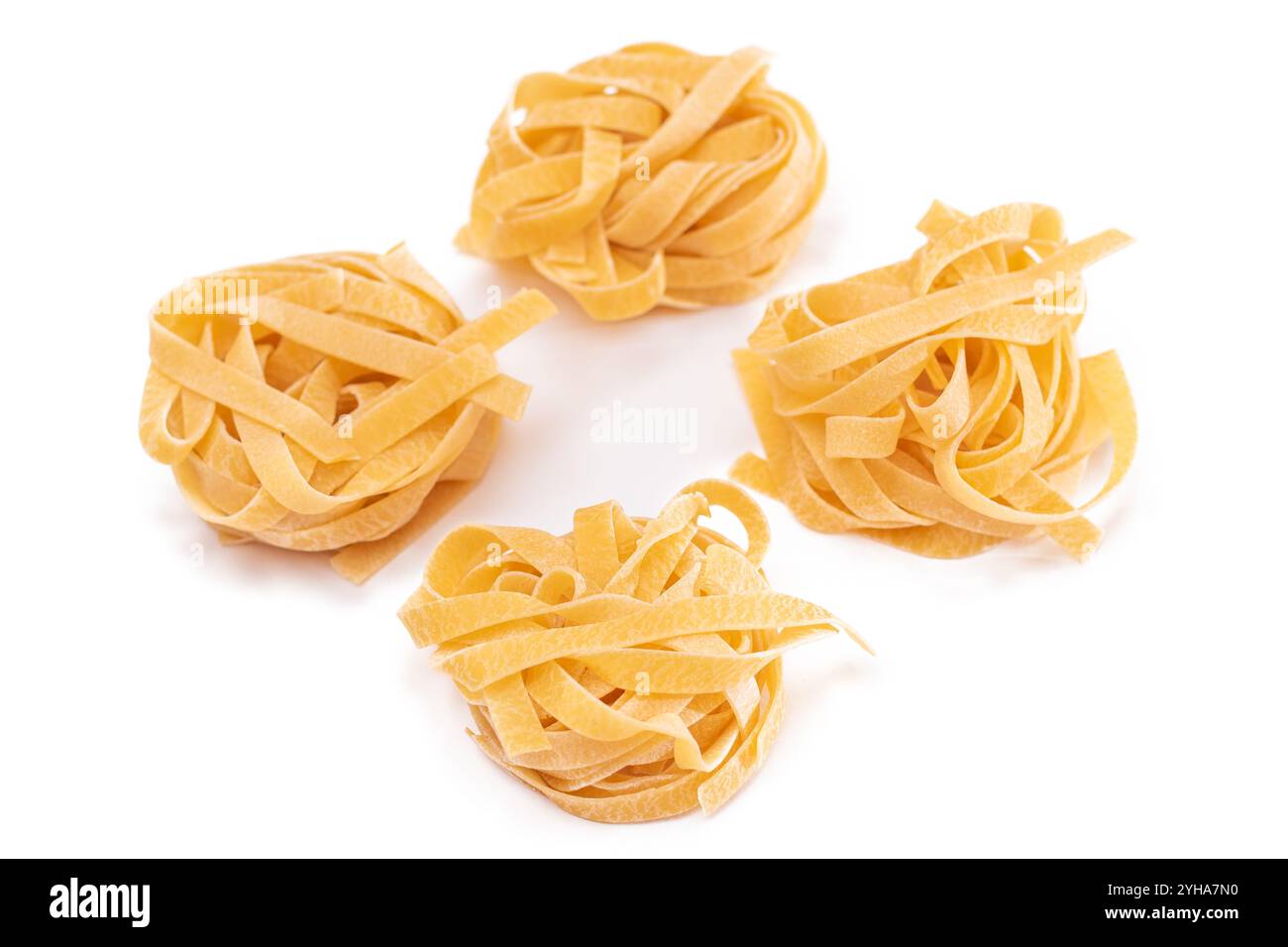 Four Classic Italian Raw Egg Fettuccine - Isolated on White Background ...