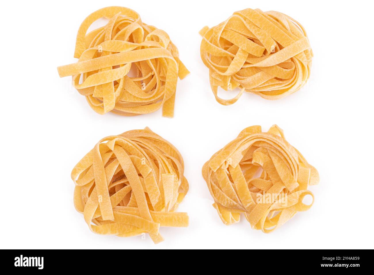 Four Classic Italian Raw Egg Fettuccine - Isolated on White Background ...