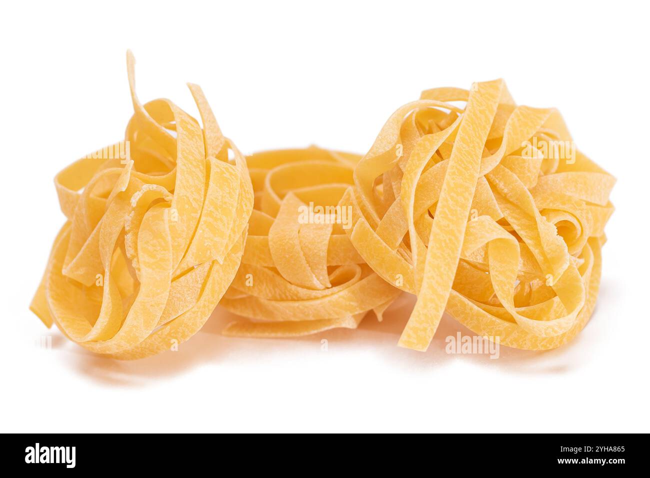 Three Classic Italian Raw Egg Fettuccine - Isolated on White Background ...