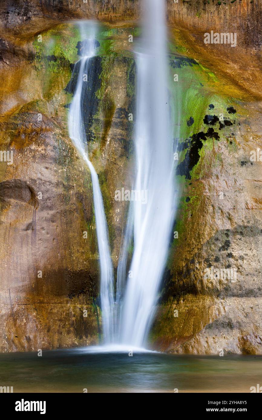 The bottom of Lower Calf Creek Falls pouring into a pool below. Grand ...