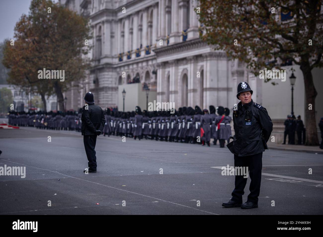 The military and civilian servicemen and women march during the ...
