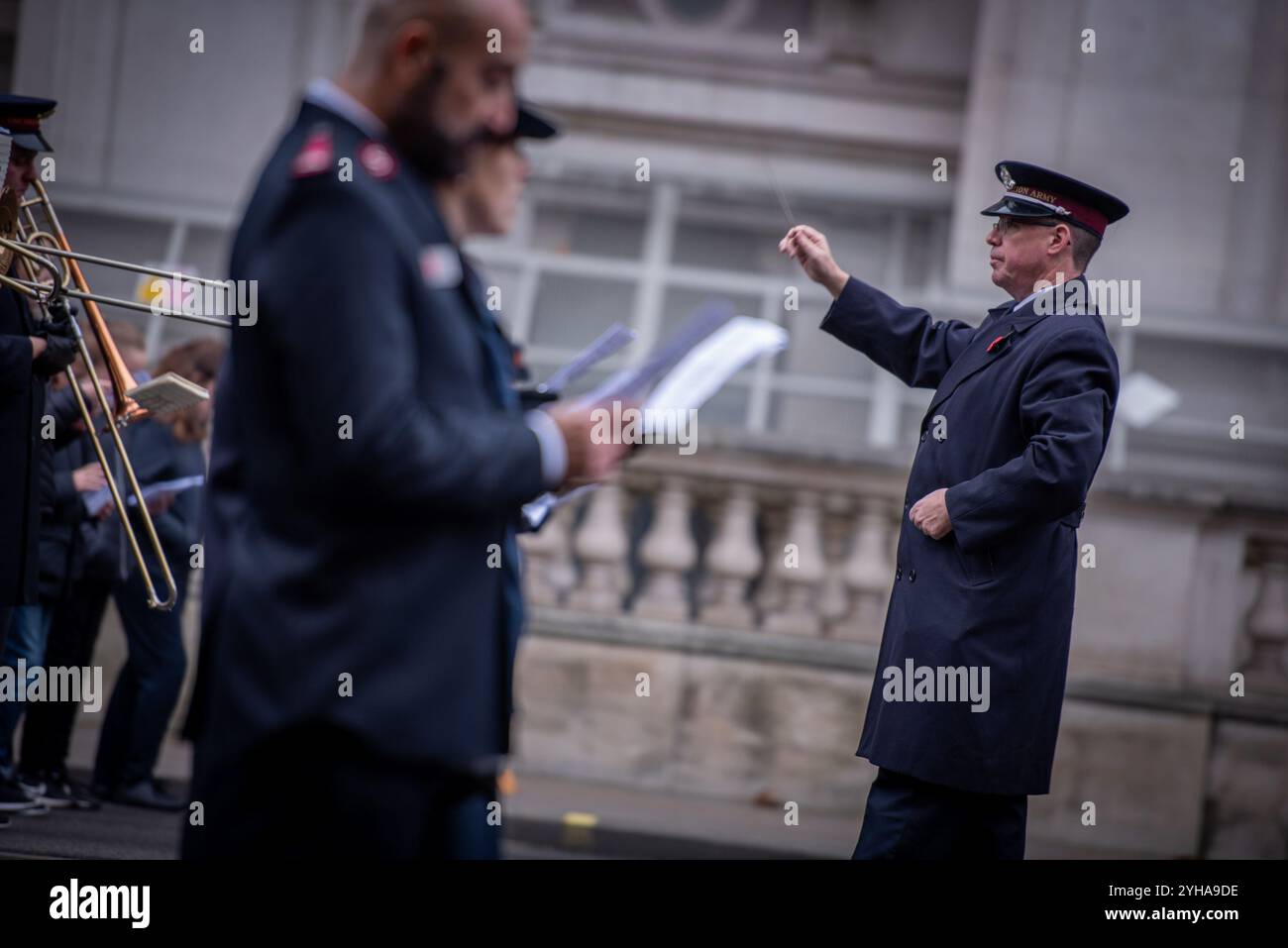 London, UK. 10th Nov, 2024. A conductor instructs the band during the ...