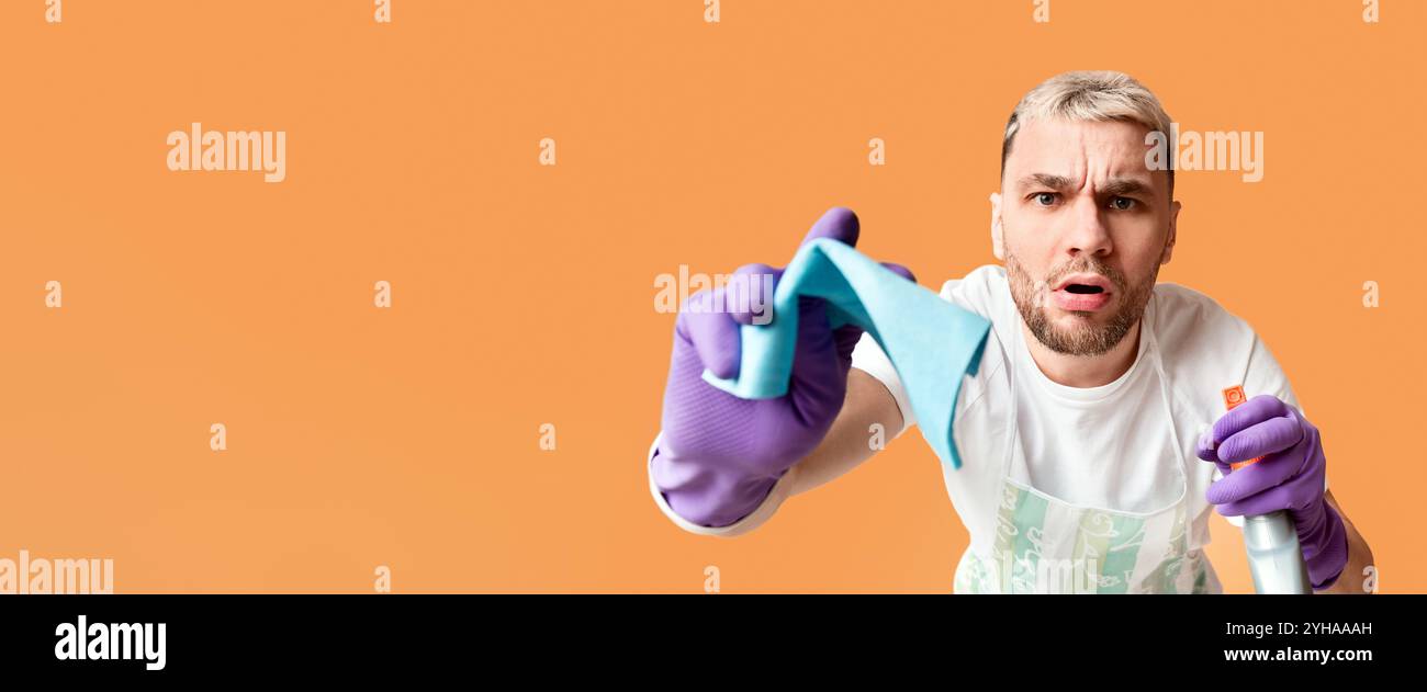 Housekeeping concept. Funny boy wiping screen sponge Stock Photo - Alamy
