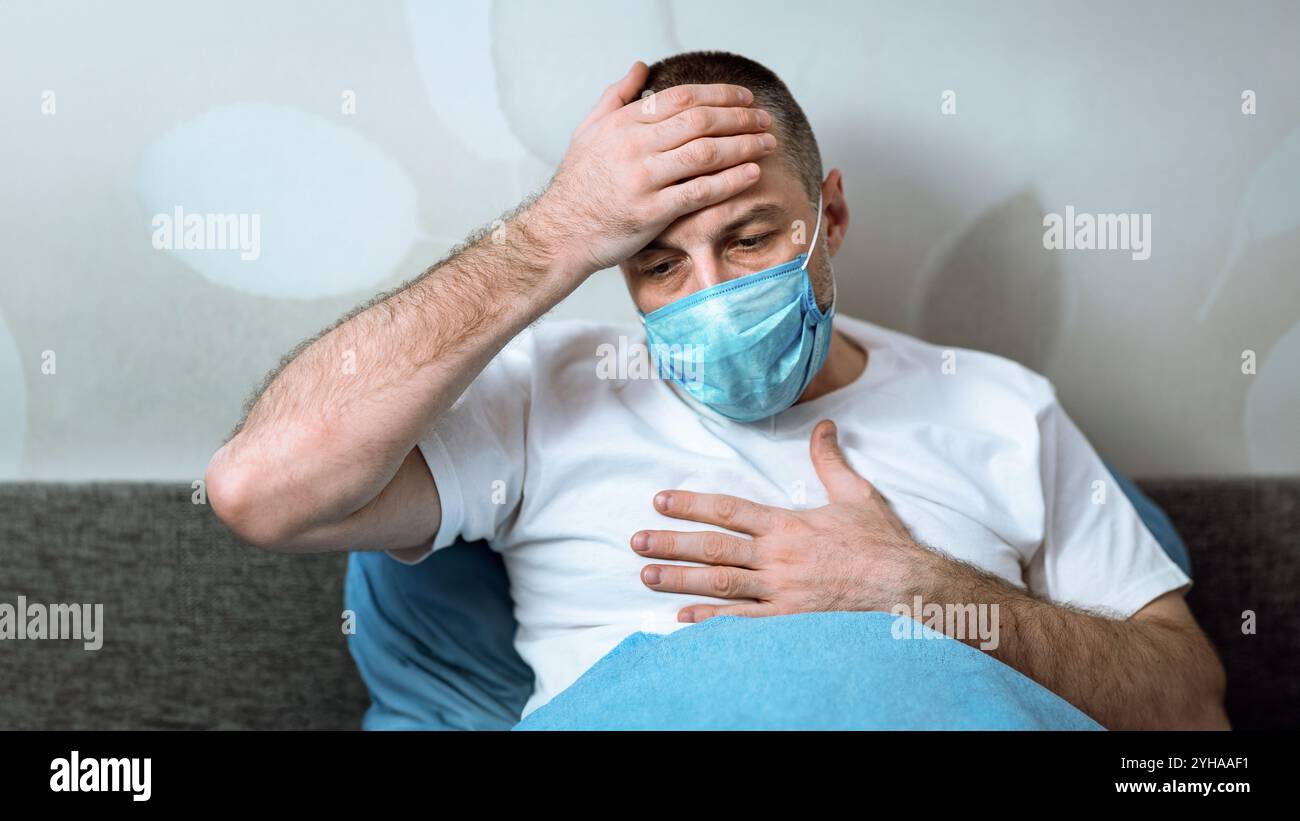 Sick Man Having Fever And Breathing Difficulty Lying In Bed Stock Photo ...