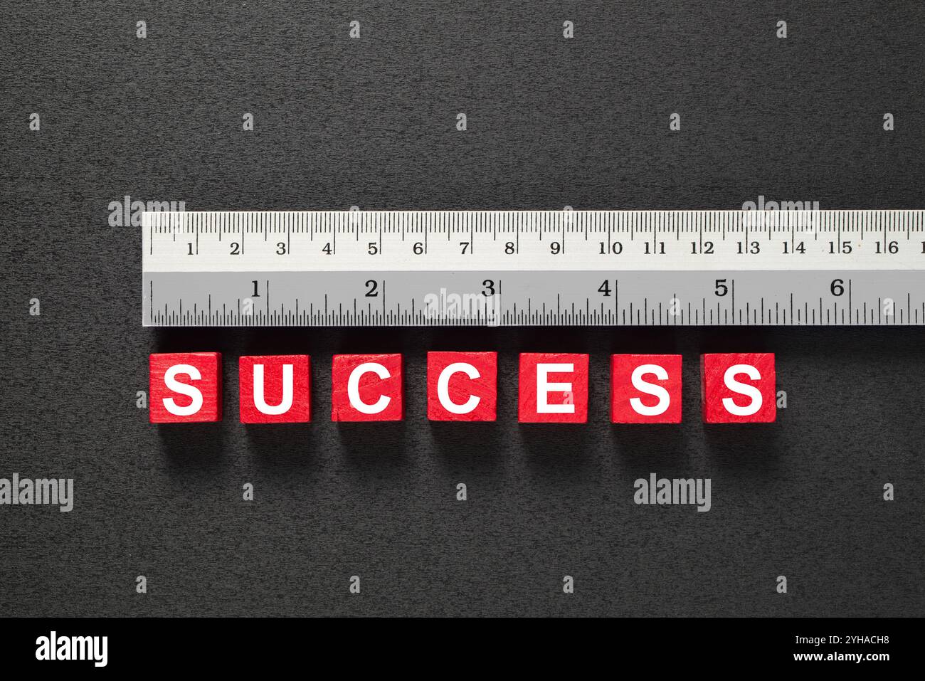 Measure success word using ruler Stock Photo - Alamy