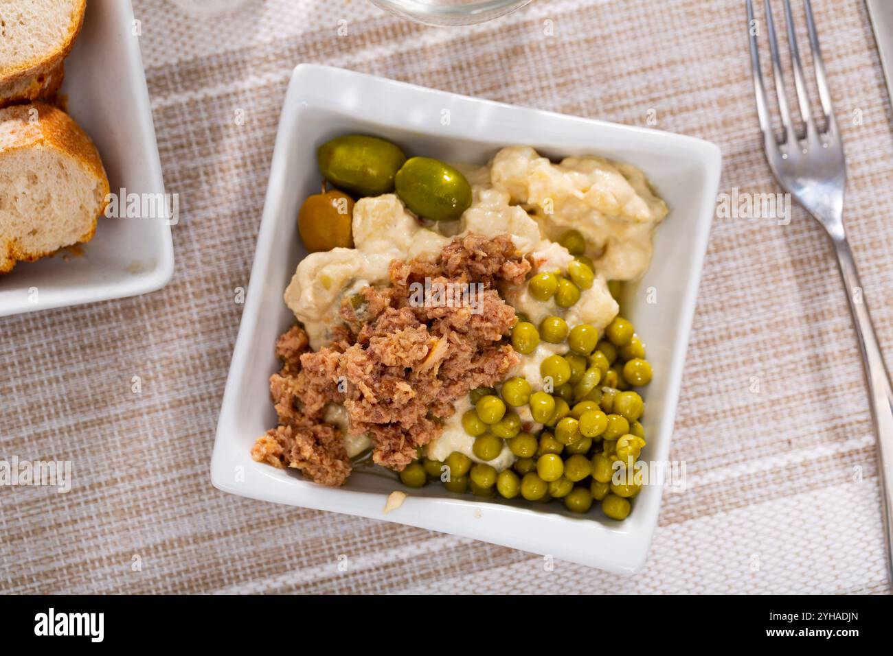 Spanish salad called Ensalada rusa Stock Photo - Alamy