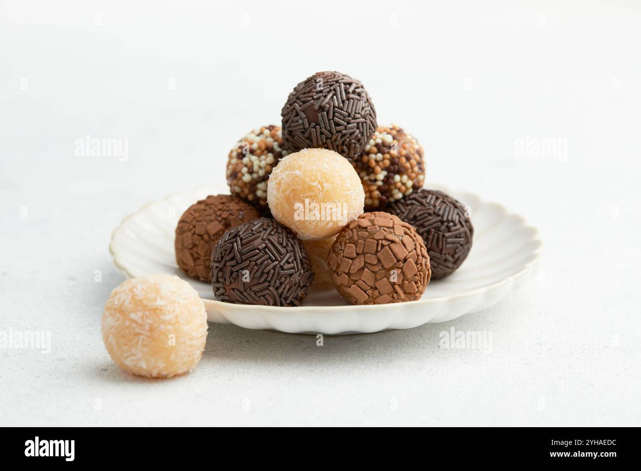 Typical Brazilian sweet brigadeiro. A heap of assorted flavors of ...