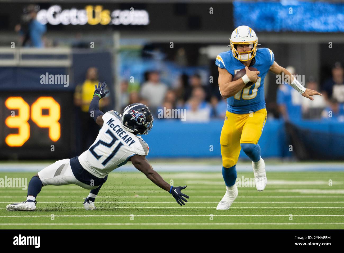 Los Angeles Chargers quarterback Justin Herbert (10) runs with the ball ...