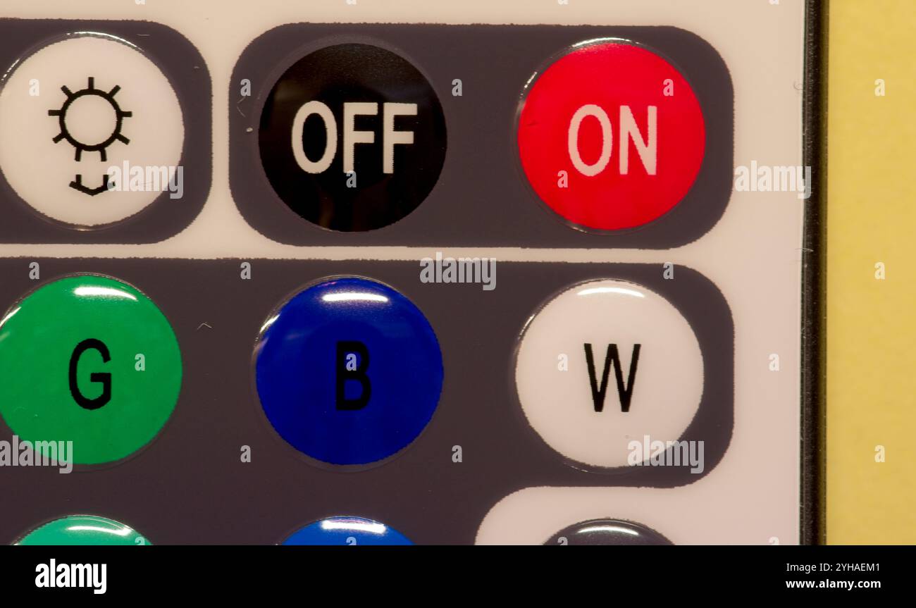 Buttons on a remote controller for LED lighting Stock Photo - Alamy