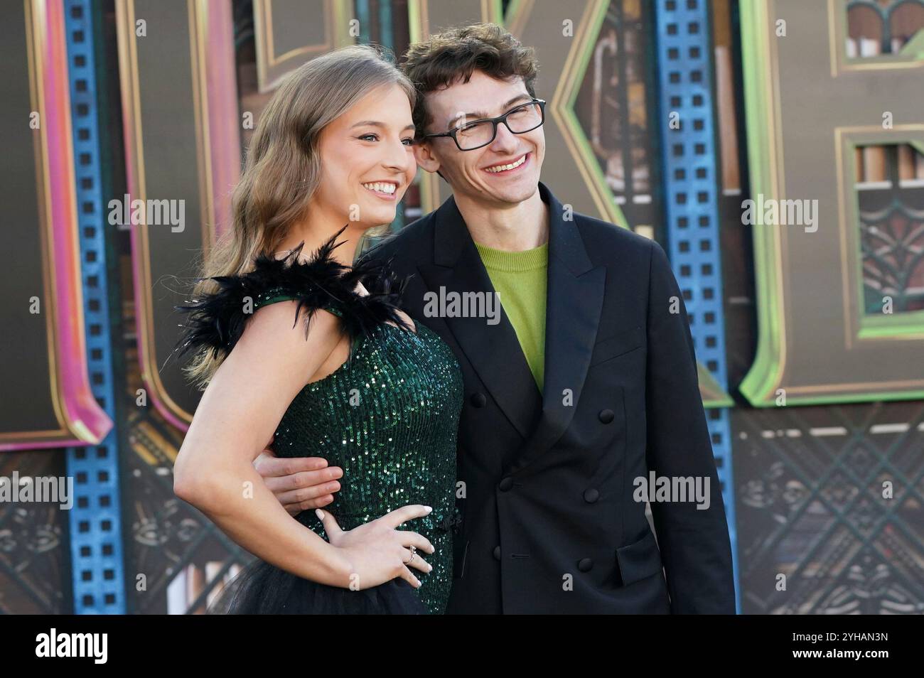 Tess McCracken, left, and Stephen Nedoroscik arrive at the premiere of ...