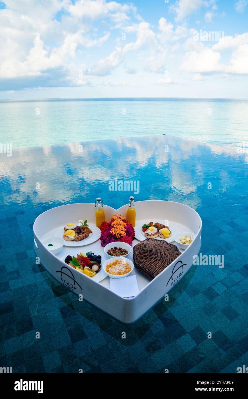 Floating breakfast in a heart shape in the pool in Maldives Stock Photo ...