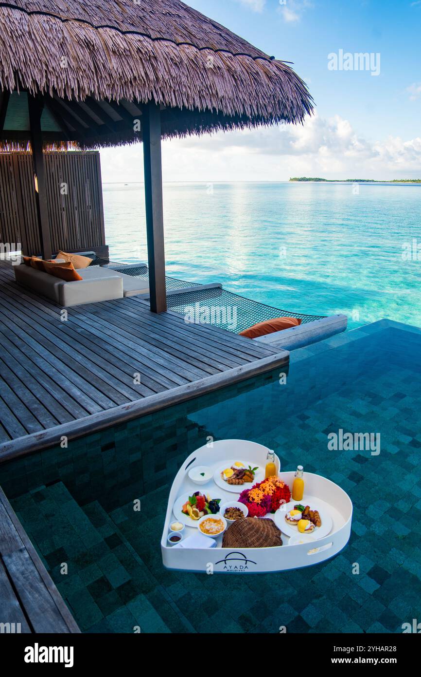 Floating breakfast in a heart shape in the pool in Maldives Stock Photo ...