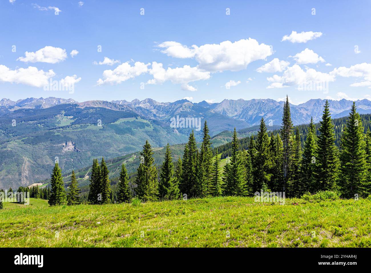 Vail summer in ski resort with hiking trail in Colorado mountain peaks ...