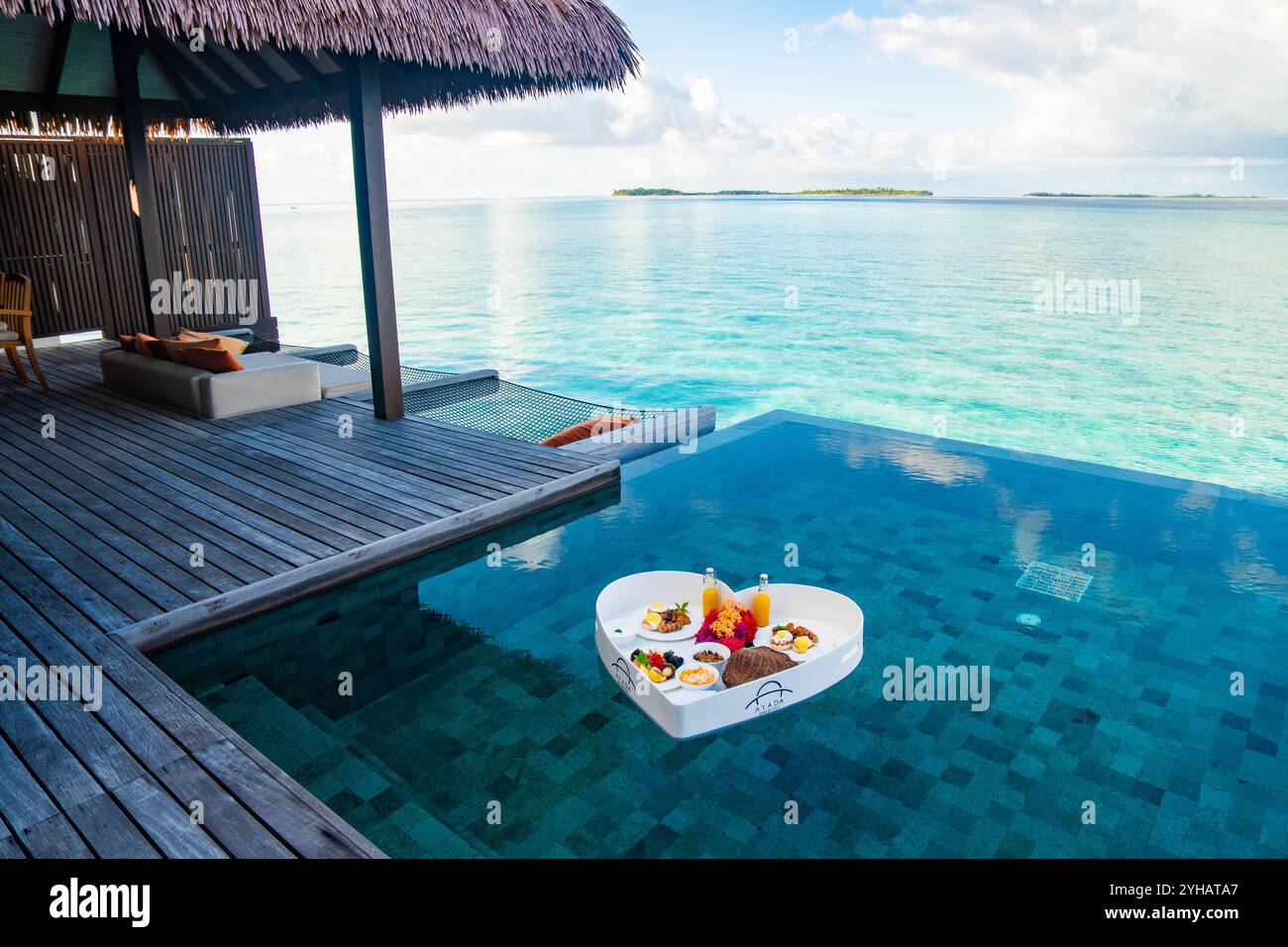 Floating breakfast in a heart shape in the pool in Maldives Stock Photo ...