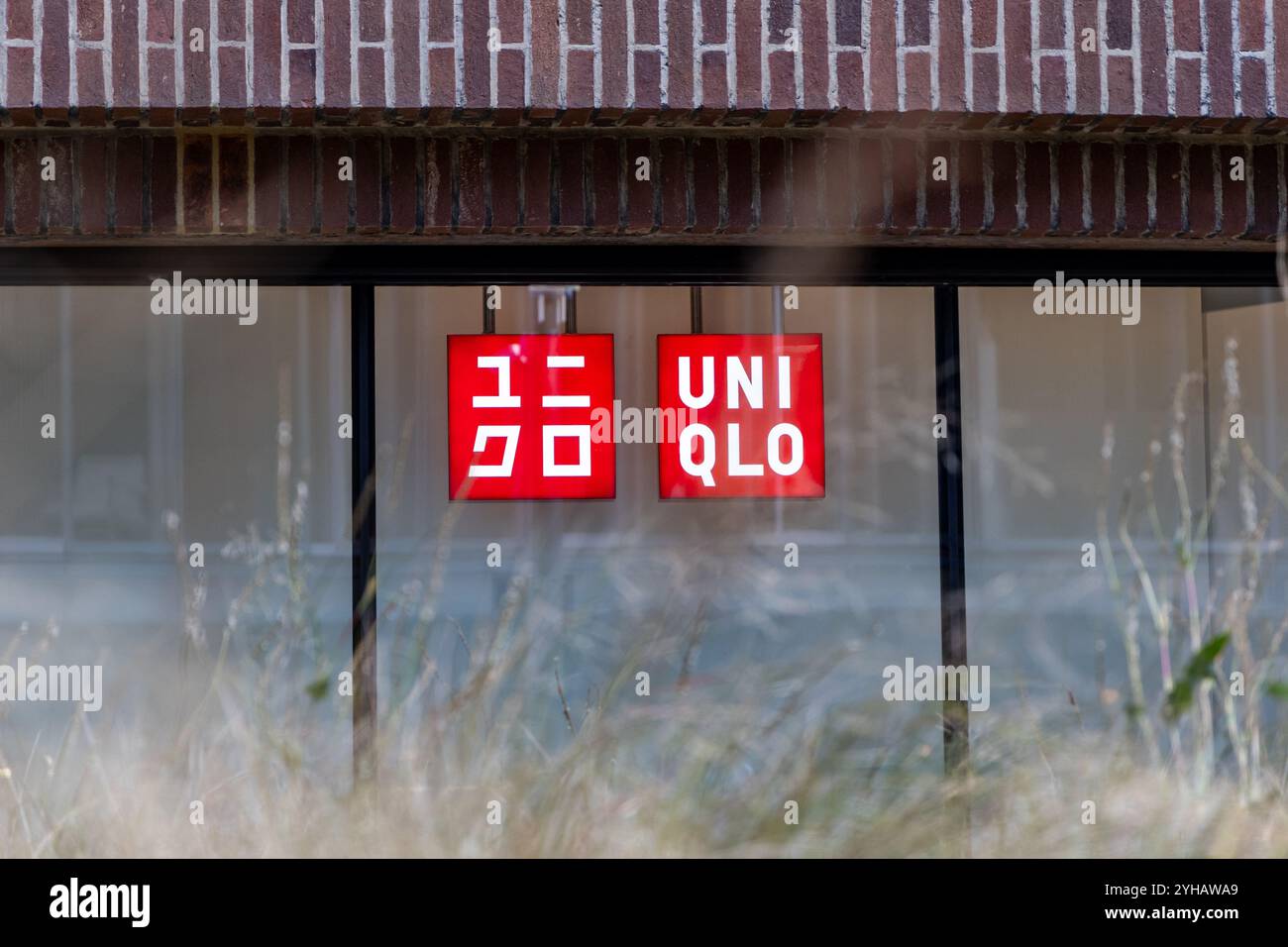 London, UK- September 19, 2024: UNIQLO store storefront with red signage Stock Photo - Alamy