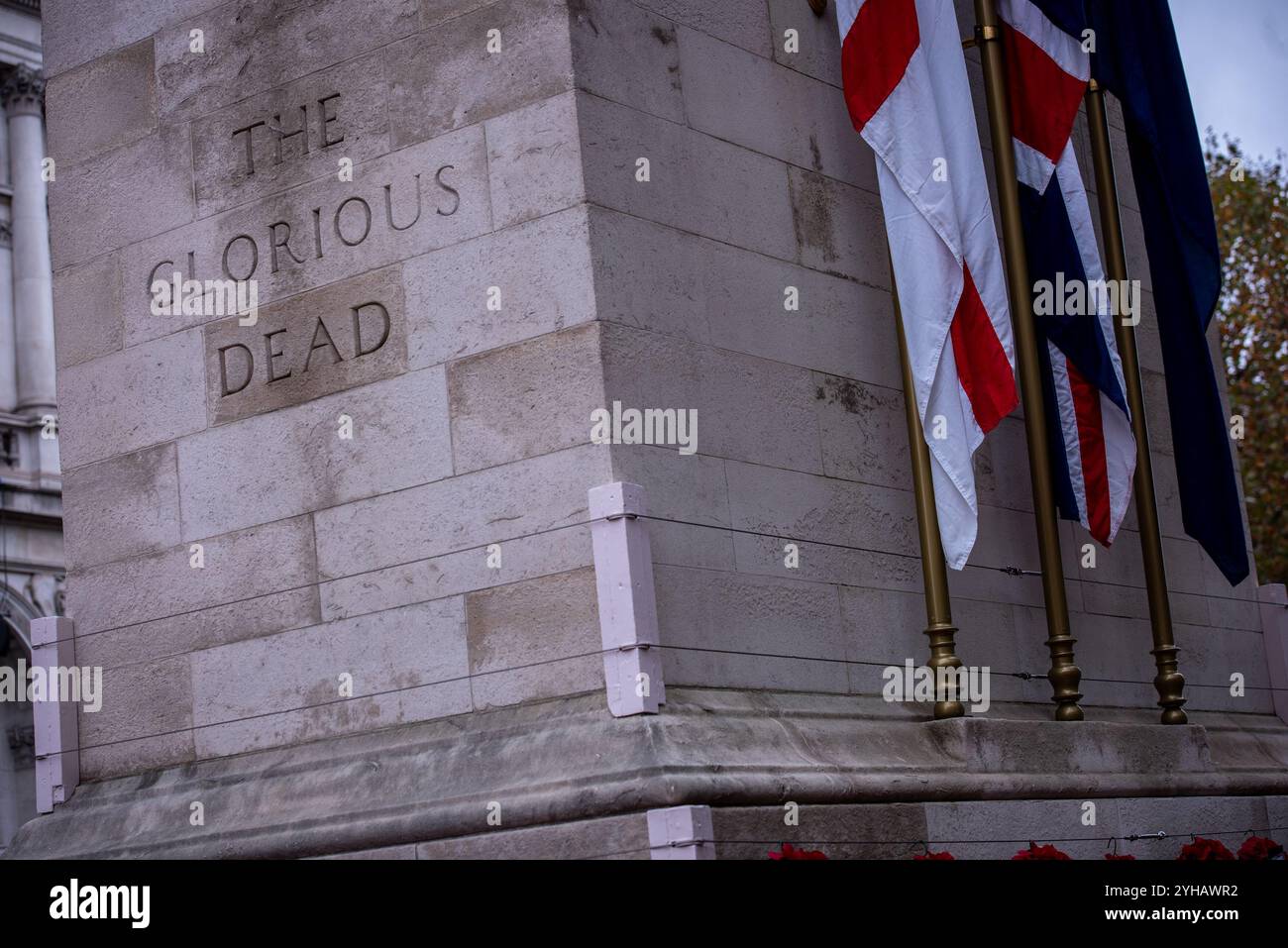 London, UK. 10th Nov, 2024. The Cenotaph which reads, "The Glorious Dead" displays flags on ...