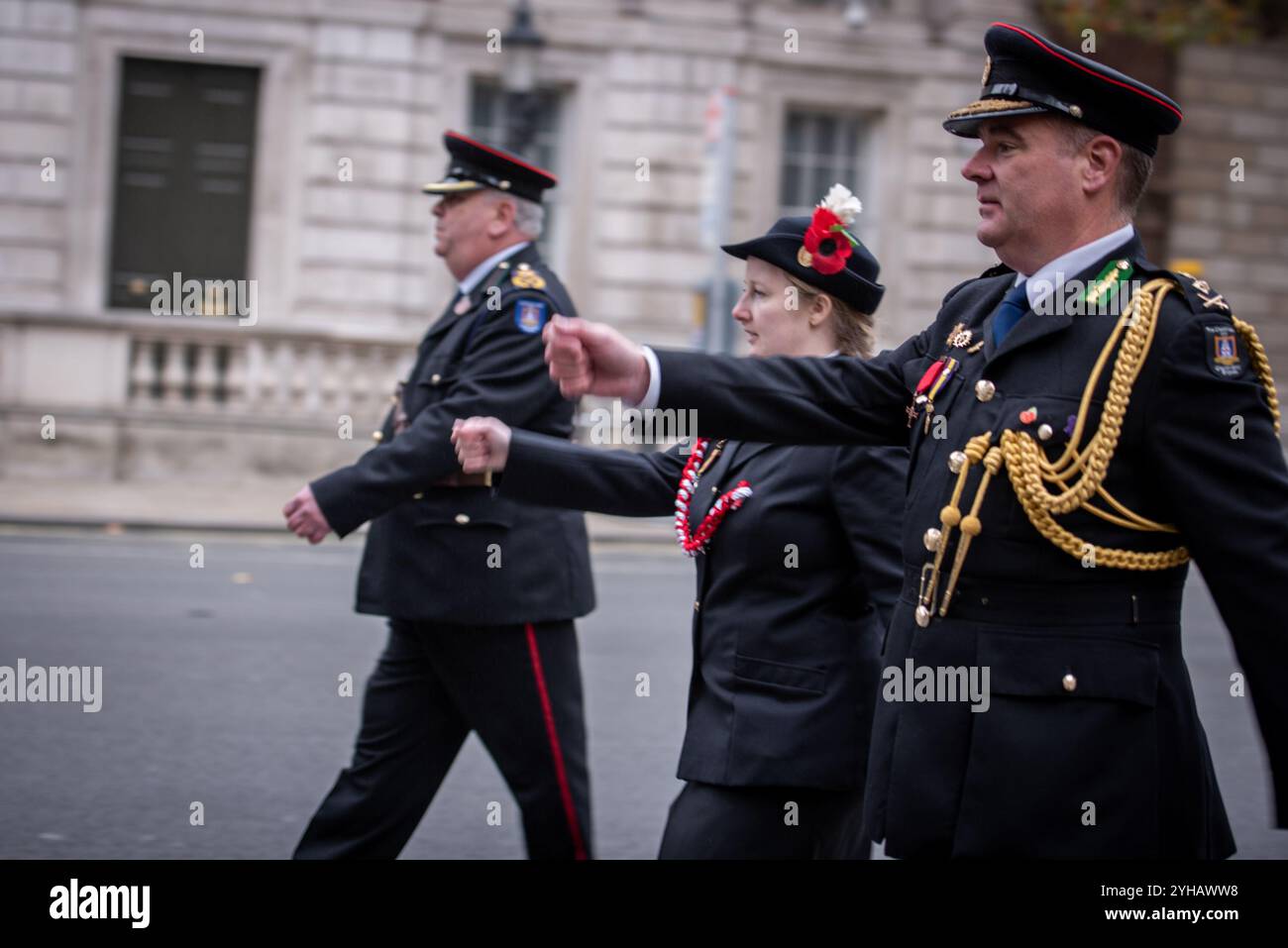 London, UK. 10th Nov, 2024. The military and civilian servicemen and women march during the ...