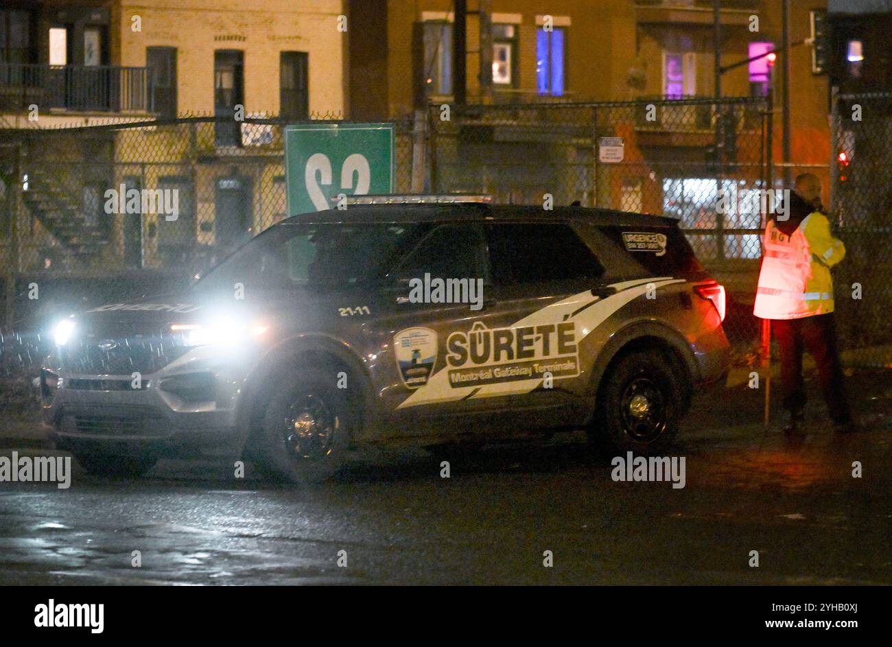 Montreal, Canada. 10th Nov, 2024. A security worker locks the gates to ...