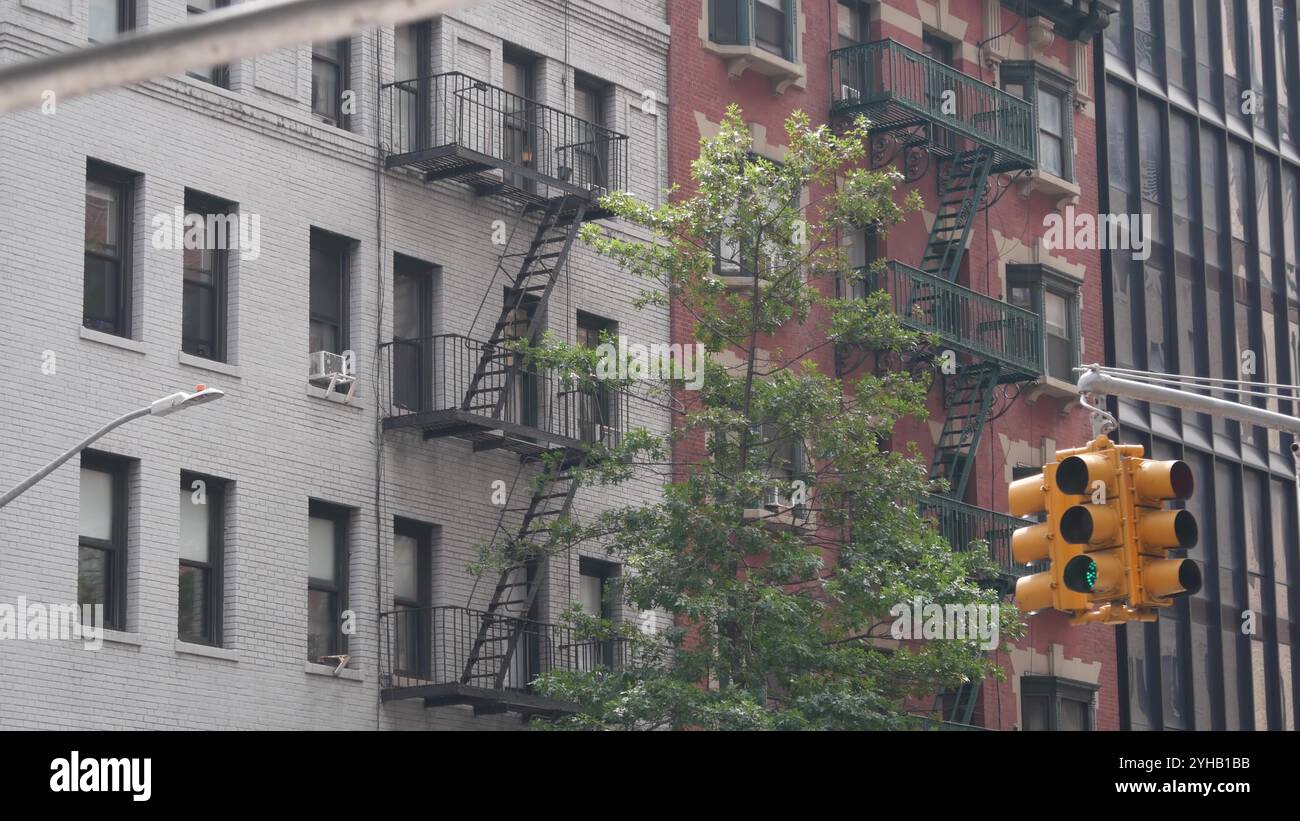 New York City street crossroad, yellow traffic light, transport road ...