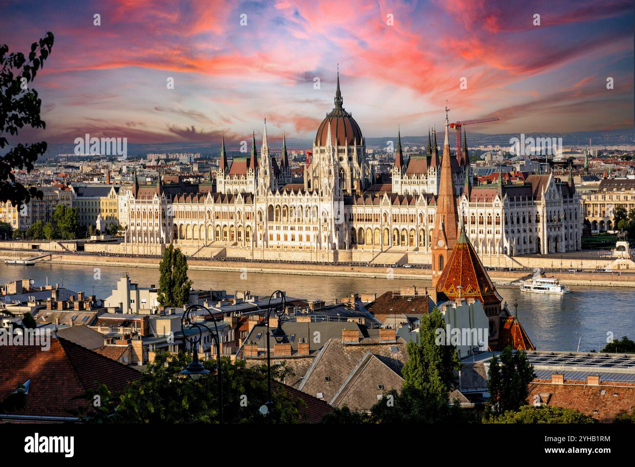 Sunset view of Budapest, highlighting the historic Parliament, Danube ...