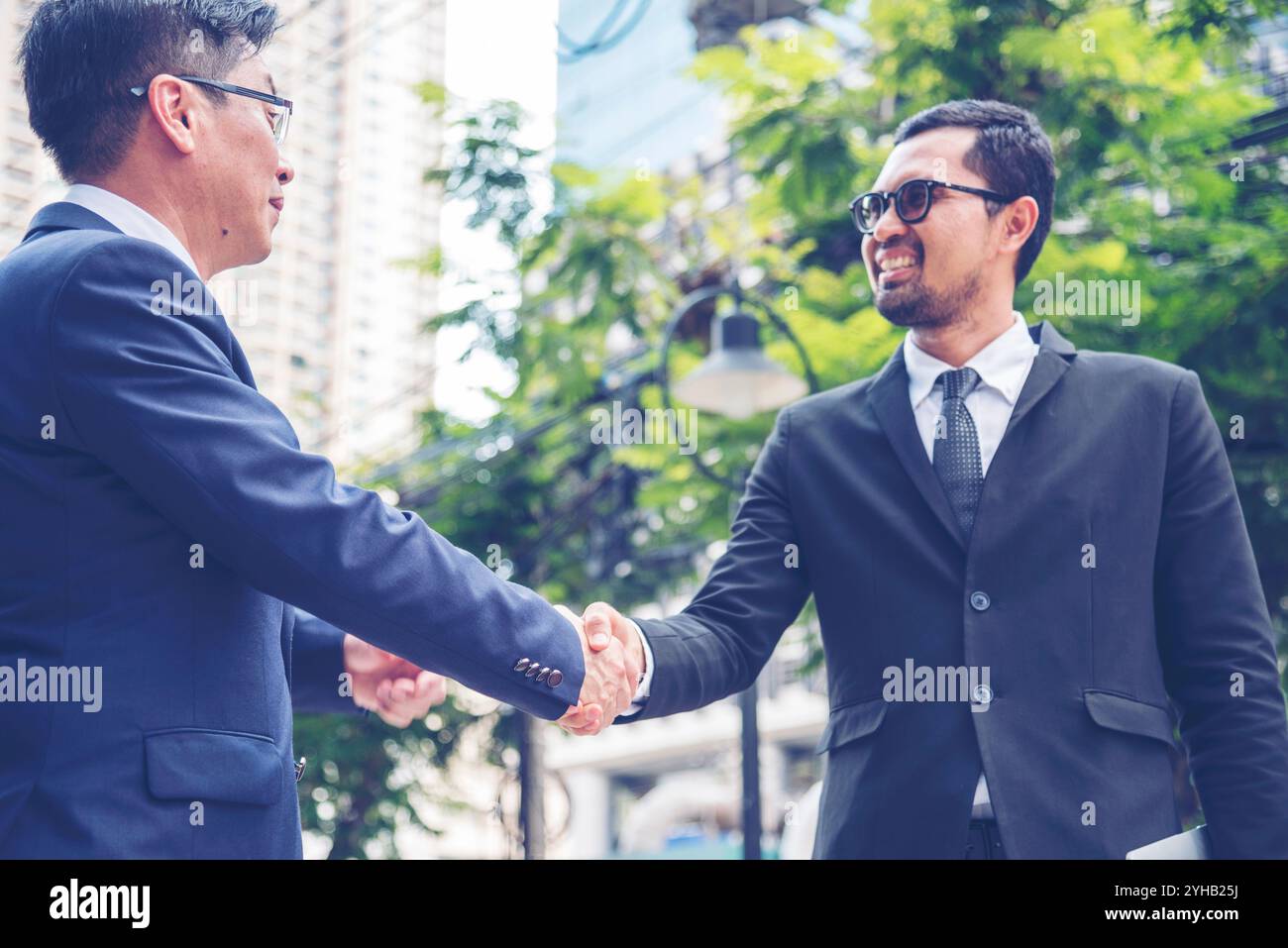 Team Business Partners shaking hands together to Greeting Start up new ...