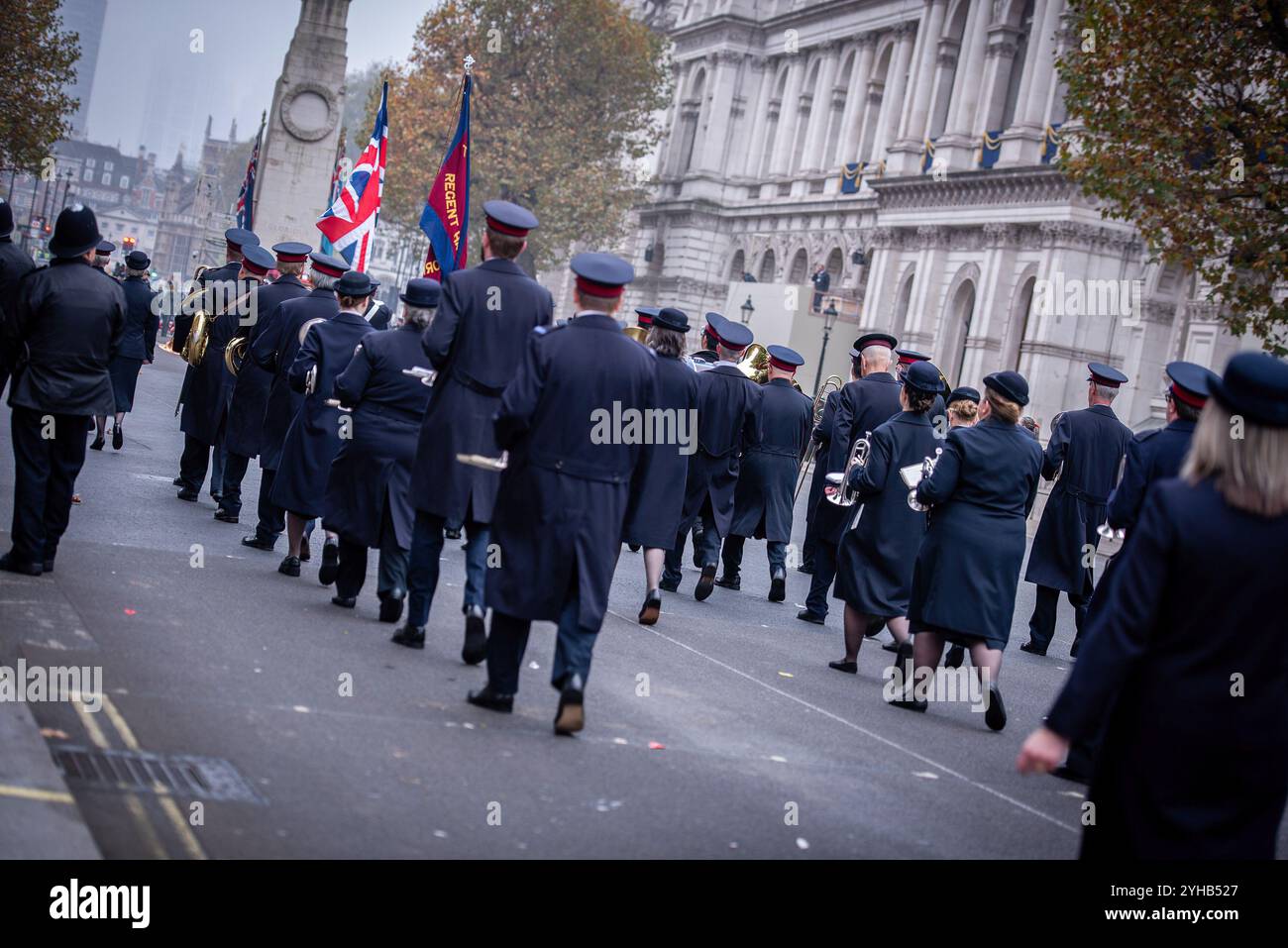 London, UK. 10th Nov, 2024. The military and civilian servicemen and women march during the ...