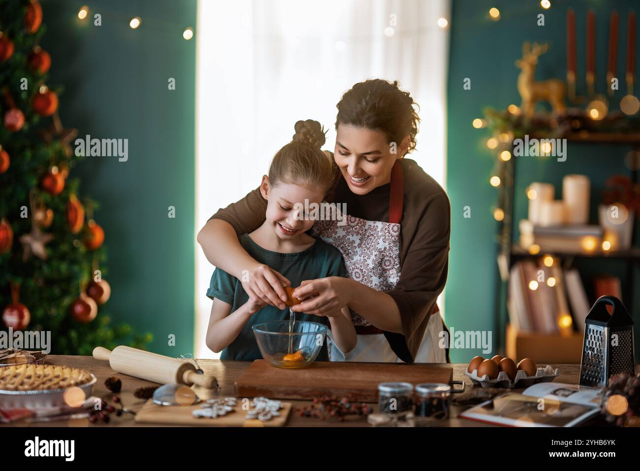 Merry Christmas and Happy Holidays. Family preparation holiday food ...