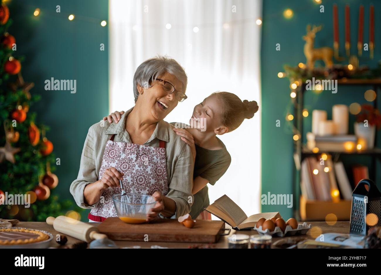 Merry Christmas and Happy Holidays. Family preparation holiday food ...