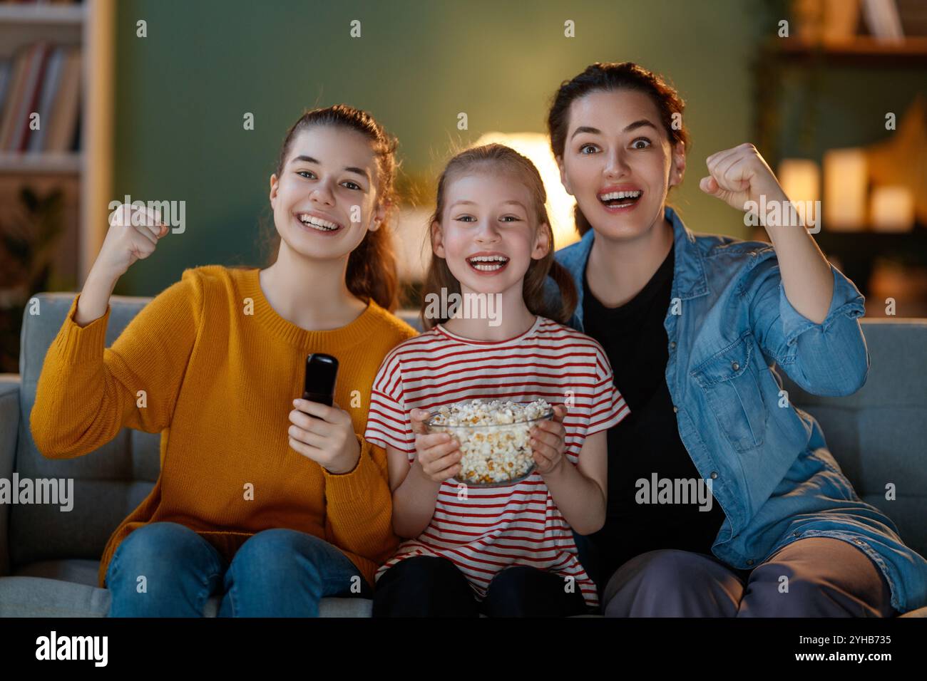 Cute children watching tv night hi-res stock photography and images - Alamy