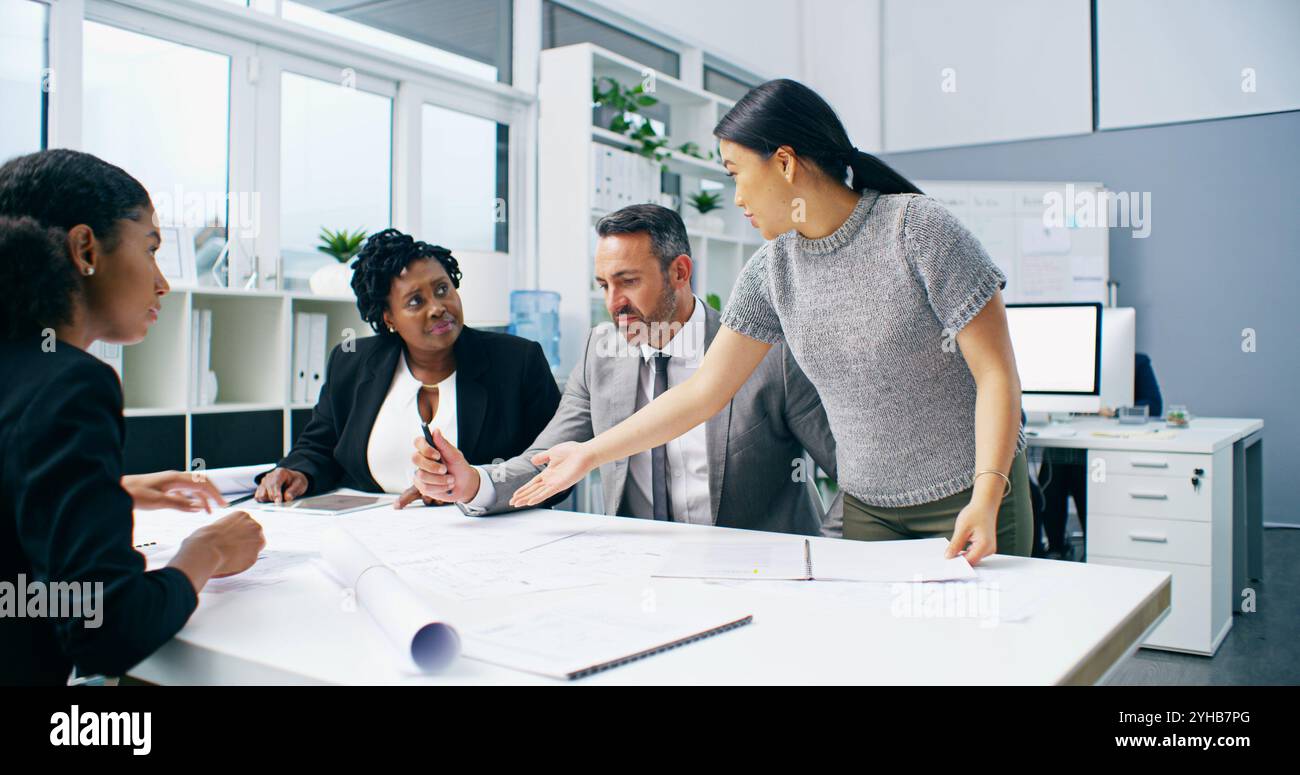 Architecture, planning and business people in meeting, blueprints and ...