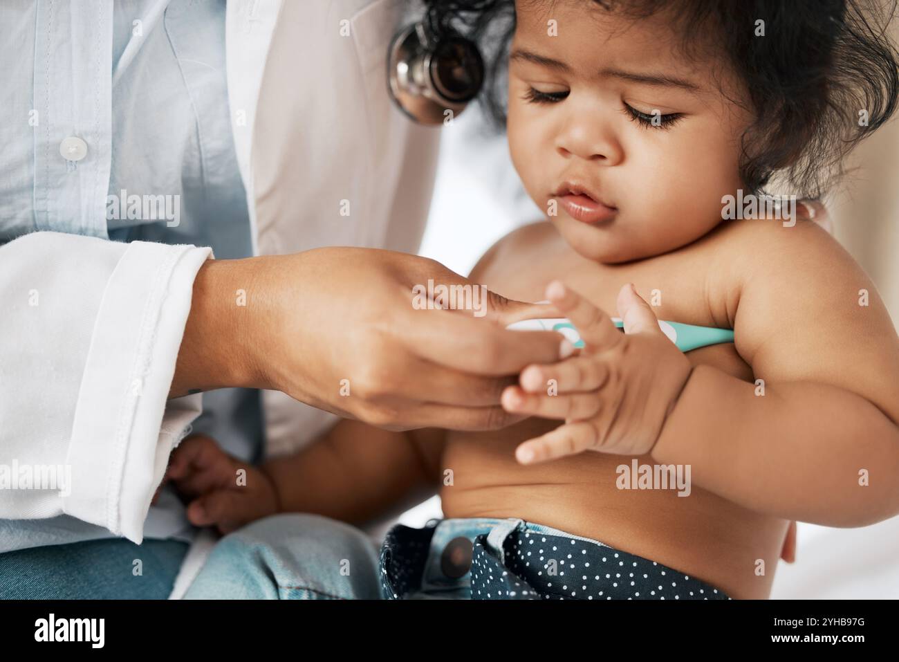 Checkup, baby and hands of doctor with thermometer, assessment and ...