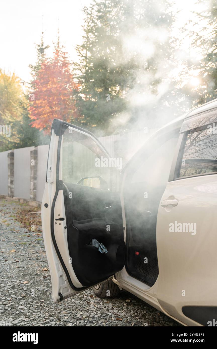 Smoke coming from under hood hi-res stock photography and images - Alamy