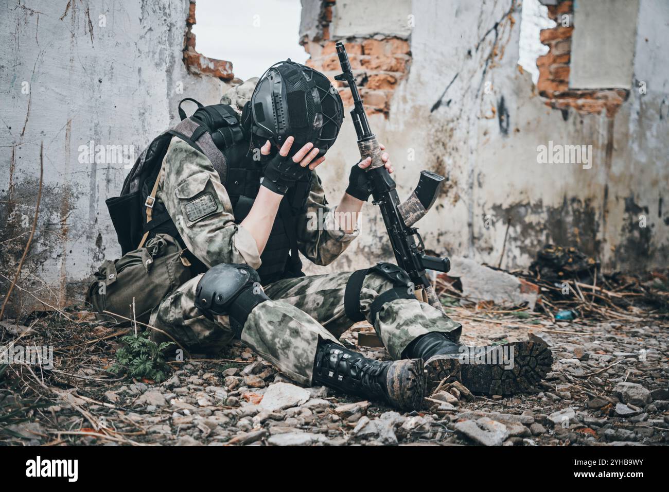 Post-traumatic stress disorder concept. A soldier in uniform with a ...