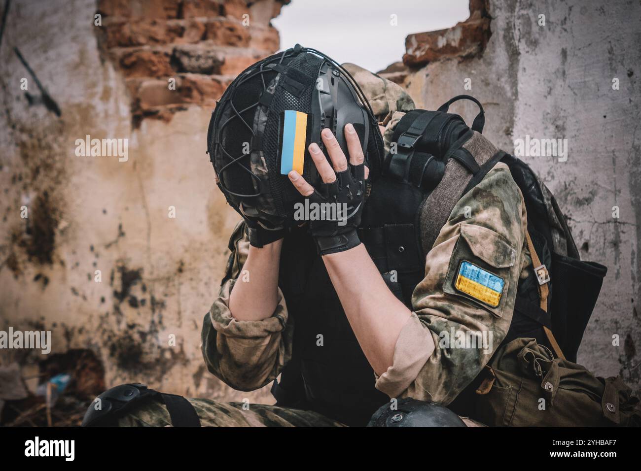 Post-traumatic stress disorder concept. A soldier in uniform with a ...