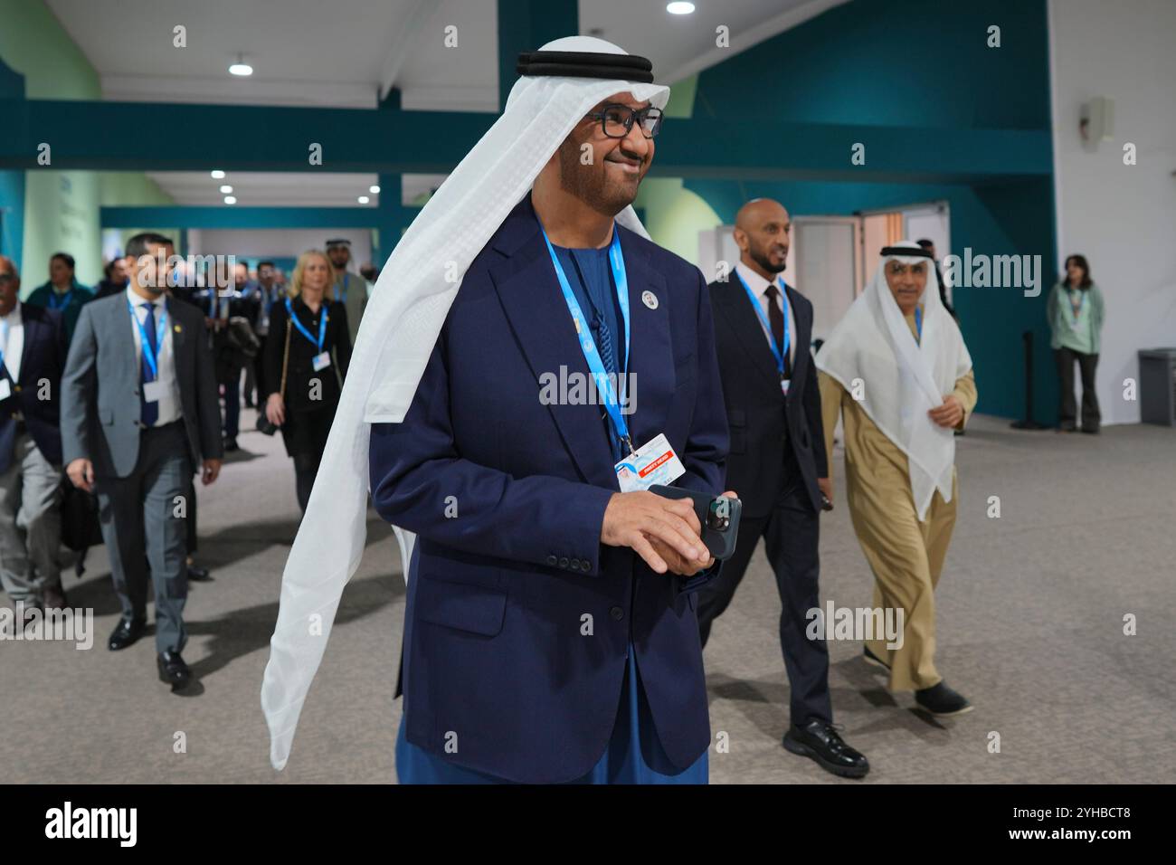 COP28 President Sultan al-Jaber walks through the COP29 U.N. Climate ...
