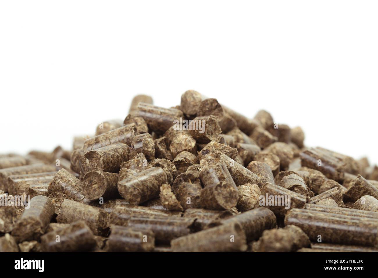 stack of wooden pellets for bio energy, white background, isolated ...