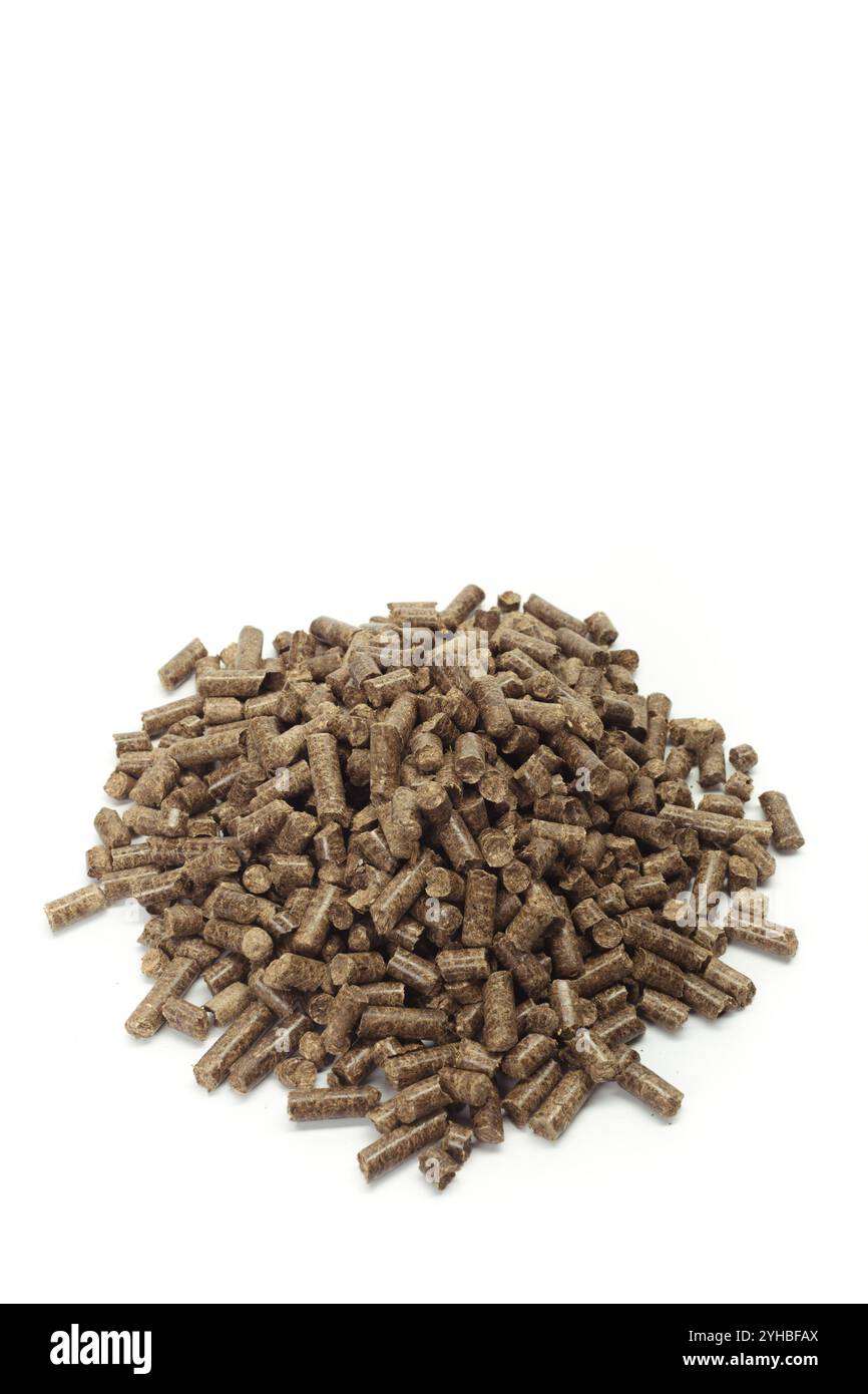stack of wooden pellets for bio energy, white background, isolated ...