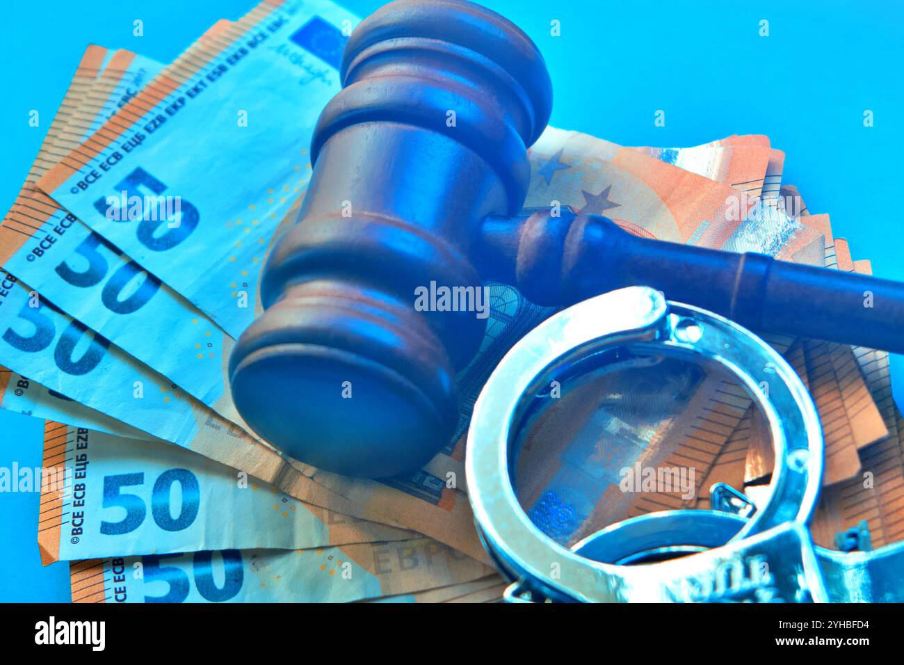 Handcuffs with hammer of judge and EURO banknotes money. crime and ...