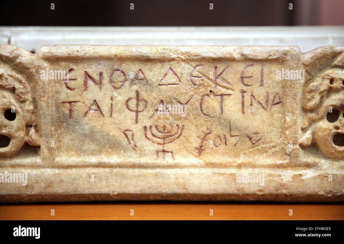 Faustgina's sarcophagus. Decorated: masks and Jewish symbols (menorah ...