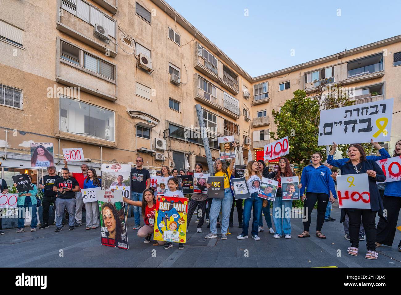 Haifa, Israel - November 09, 2024: People stand with hostage posters ...