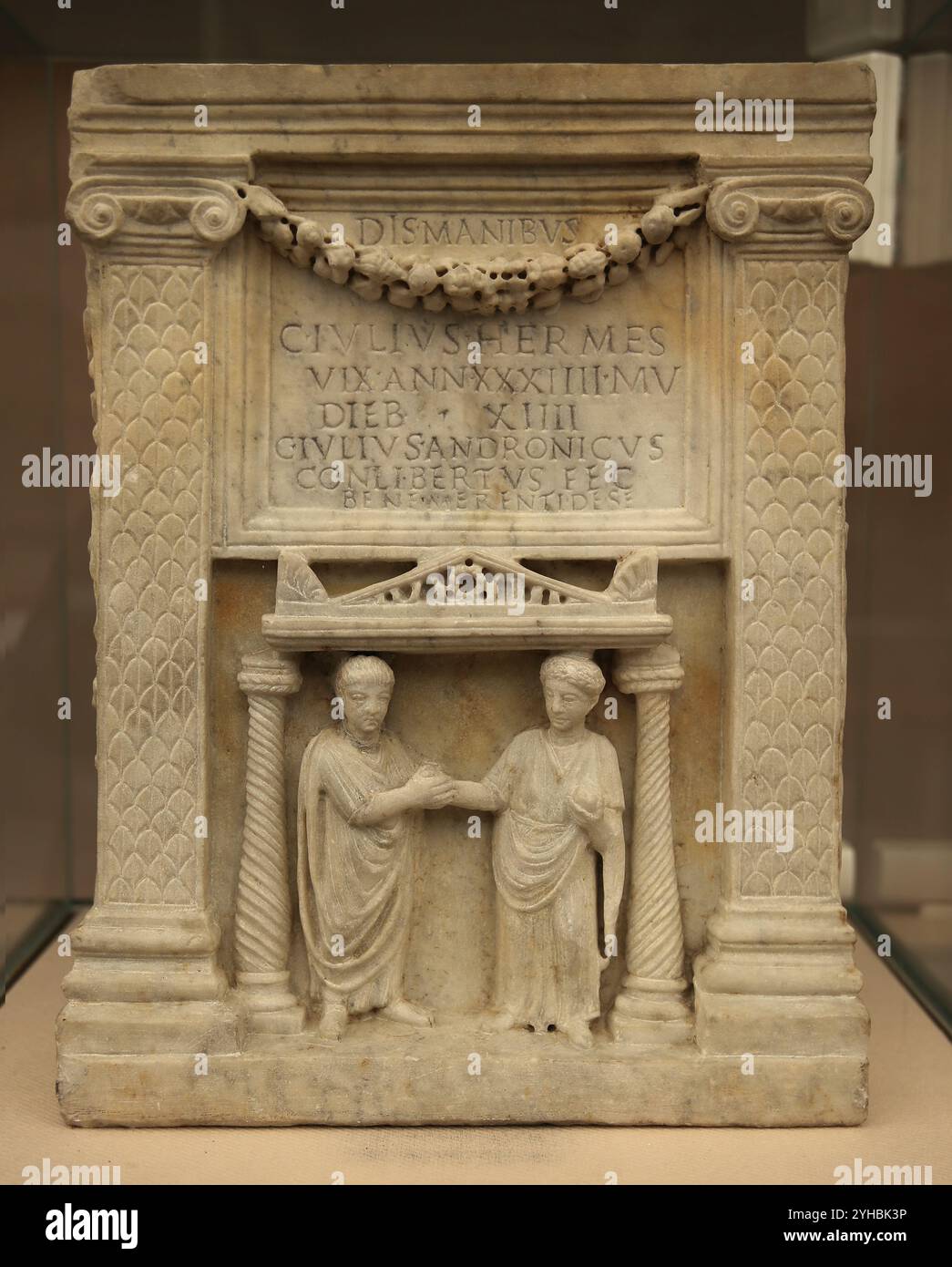 Roman urn with a dextrarum iunctio scene (act of shaking hands). Rome ...