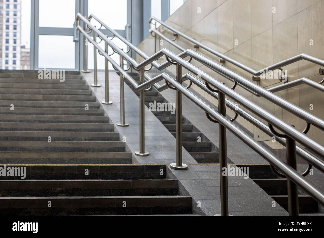 A beautifully designed set of stairs featuring a modern stainless steel ...
