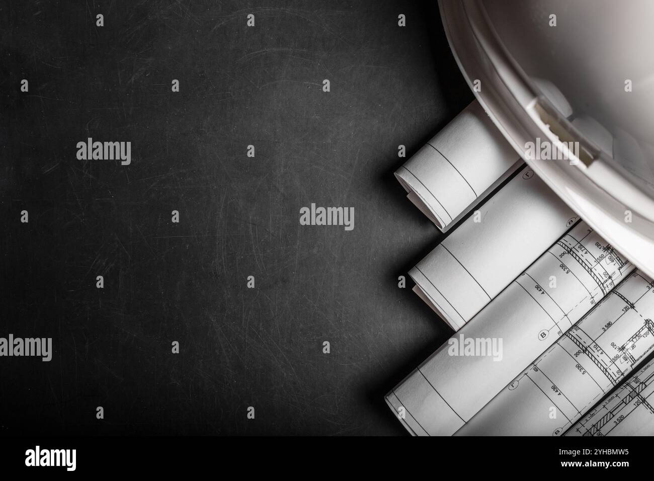 Construction planning drawings on black background Stock Photo - Alamy