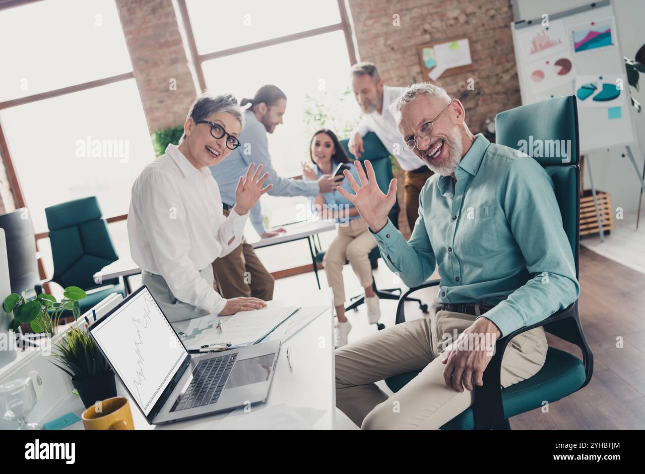 Photo of coworking project teamwork people wave hands hello work ...