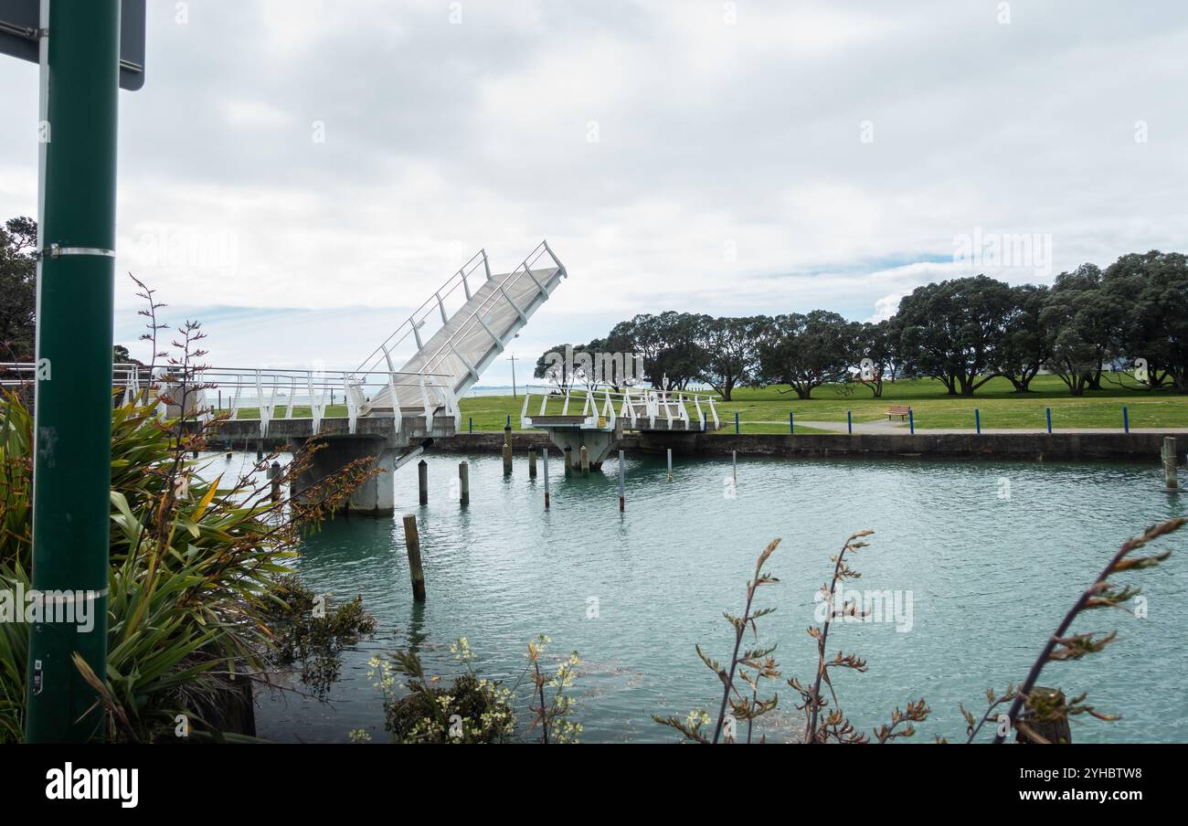 Bascule pedestrian bridge lifting to let boats pass through at Milford ...