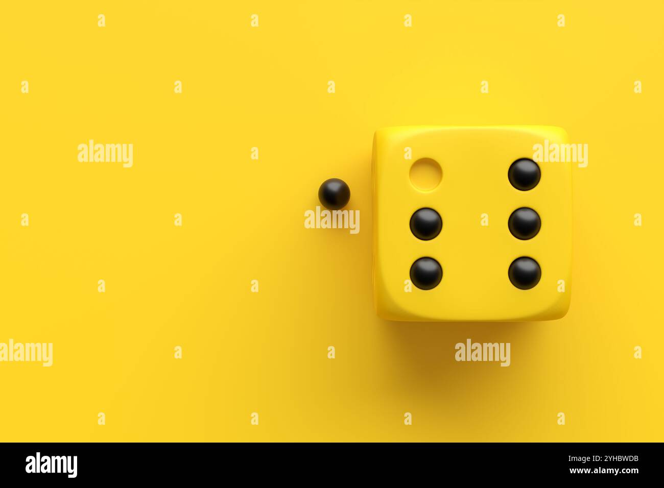 Yellow dice showing the number six with one missing dot on a yellow ...