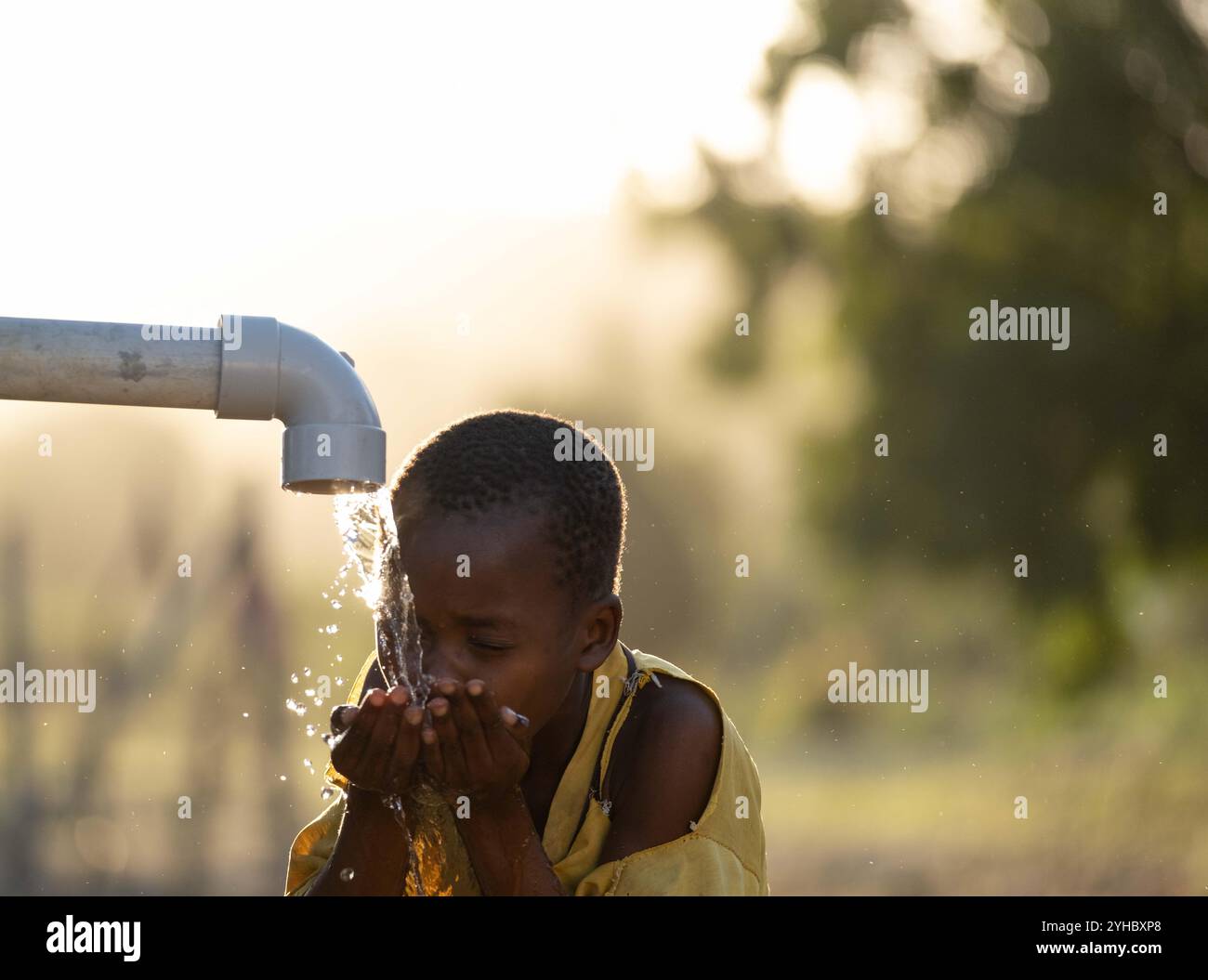 African child drinking water Stock Photo - Alamy